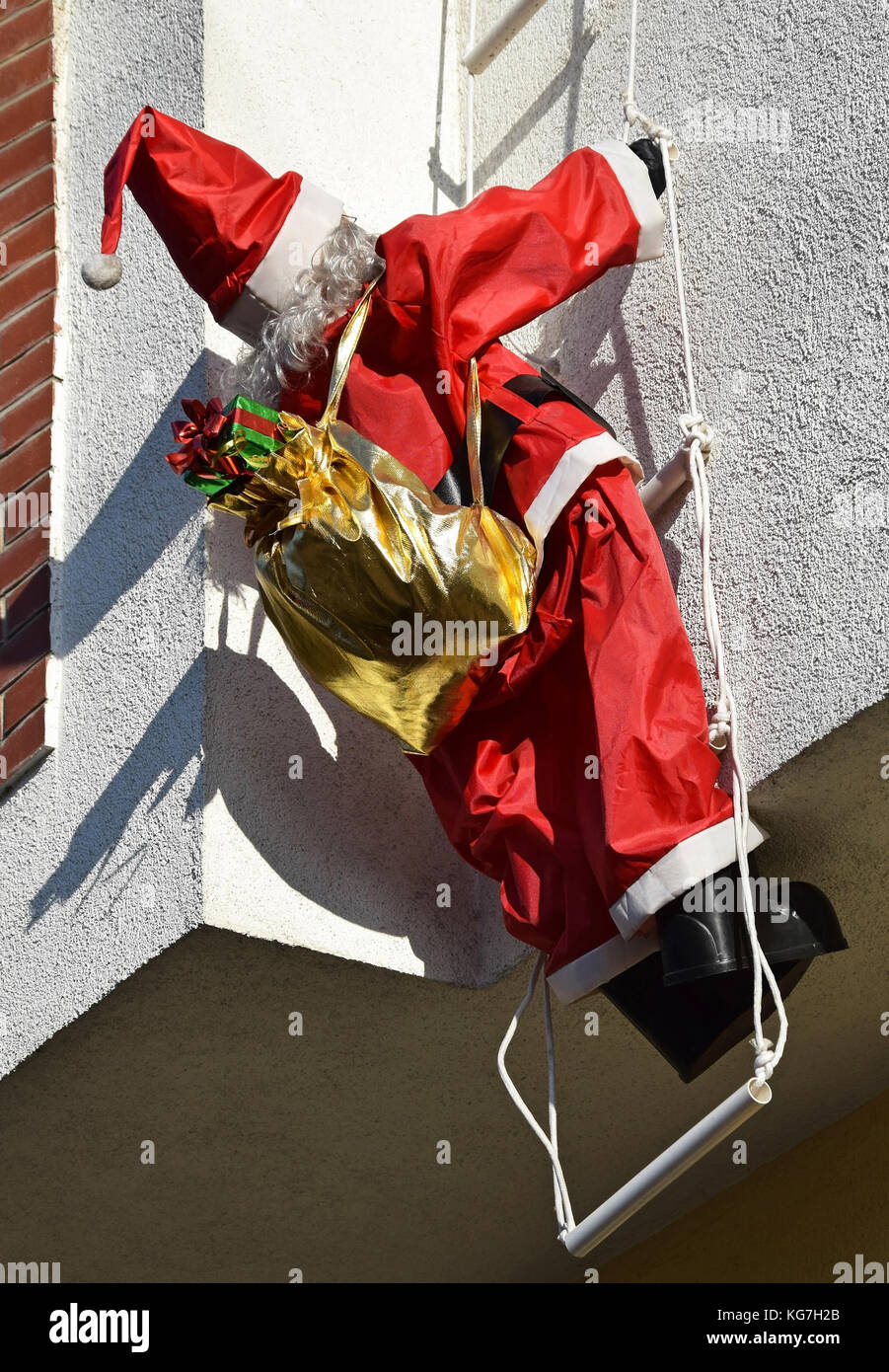 Santa Claus puppet on a ladder Stock Photo - Alamy