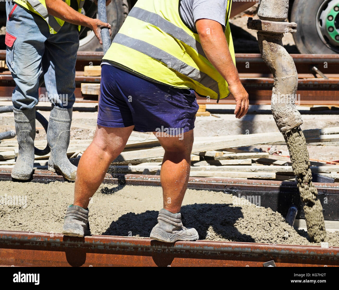 Construction workers at work Stock Photo - Alamy