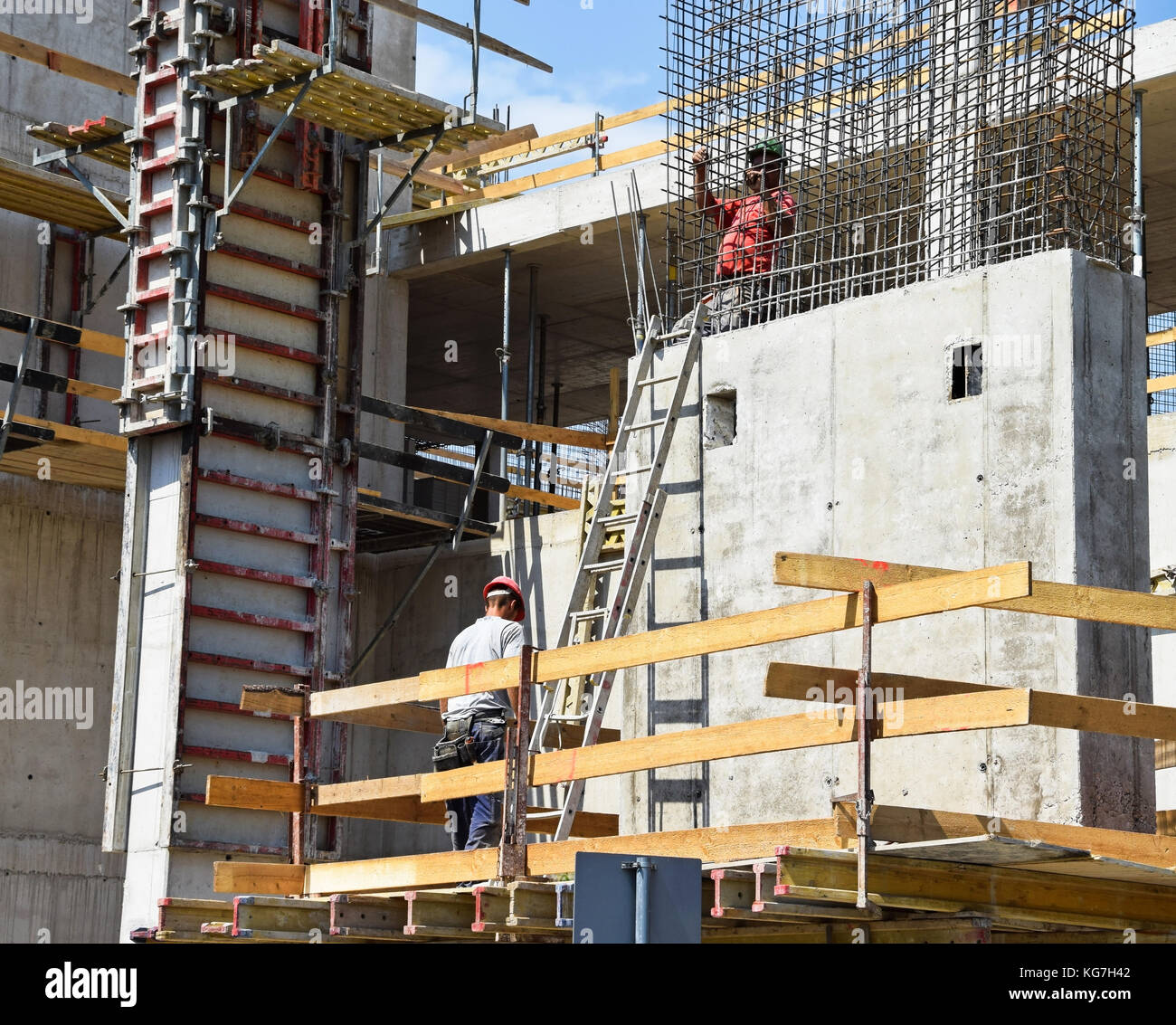 Construction workers at work Stock Photo - Alamy