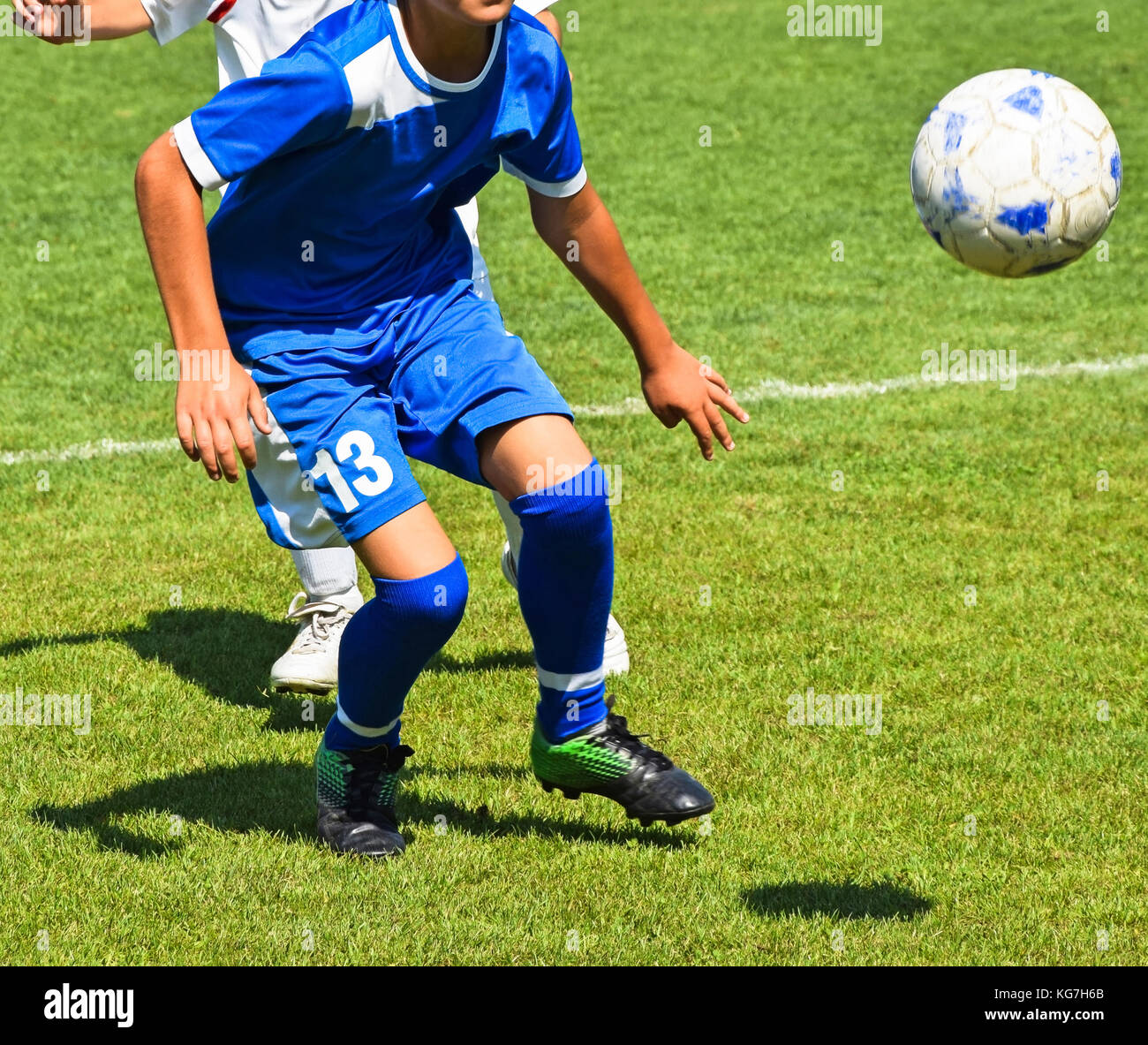 Playing soccer outdoor Stock Photo - Alamy