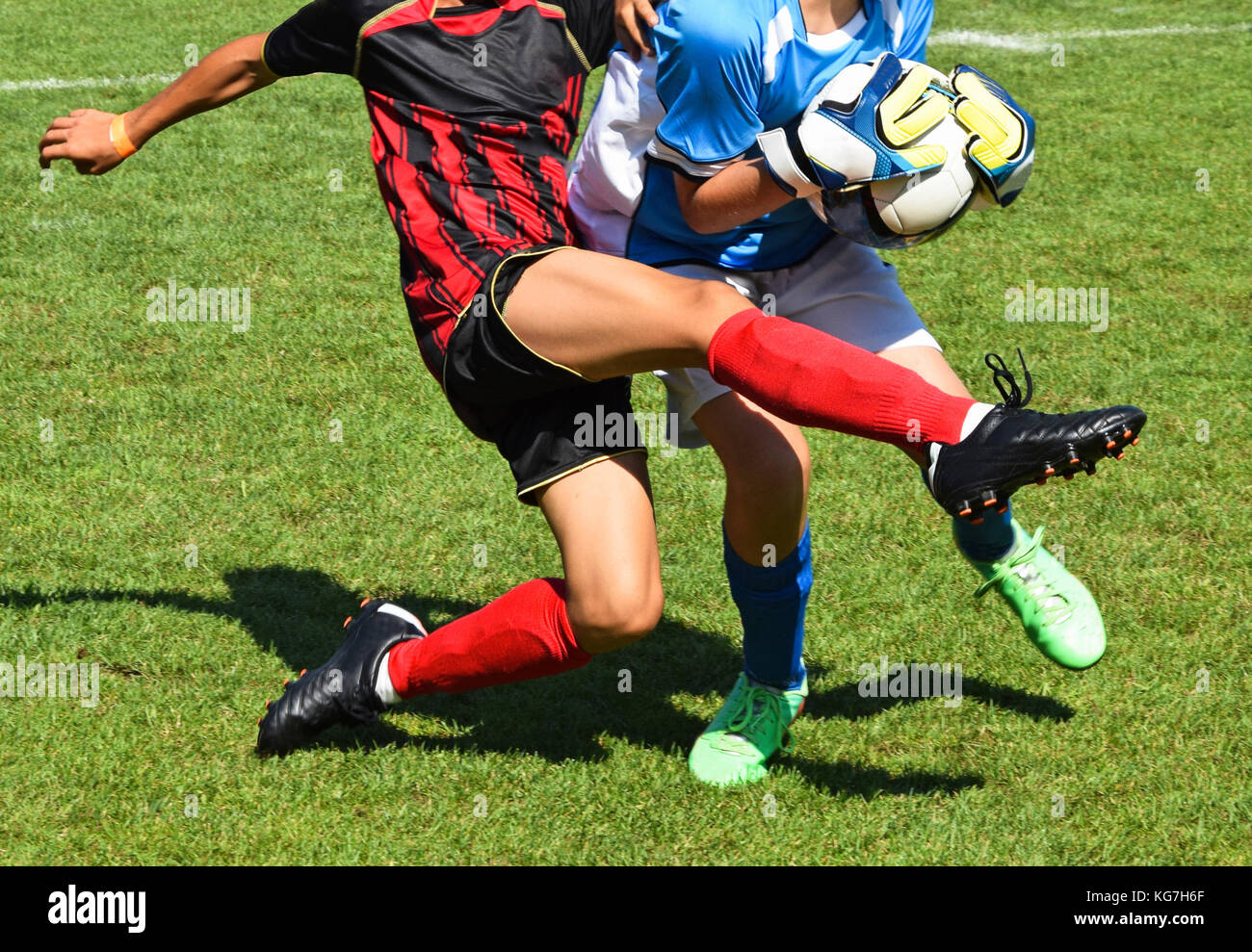 Playing soccer outdoor Stock Photo - Alamy