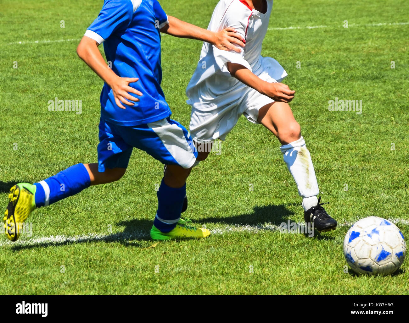 Playing soccer outdoor Stock Photo - Alamy