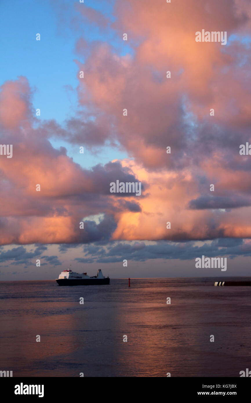 Condor ship entering st Helier port, Jersey at sunrise Stock Photo - Alamy