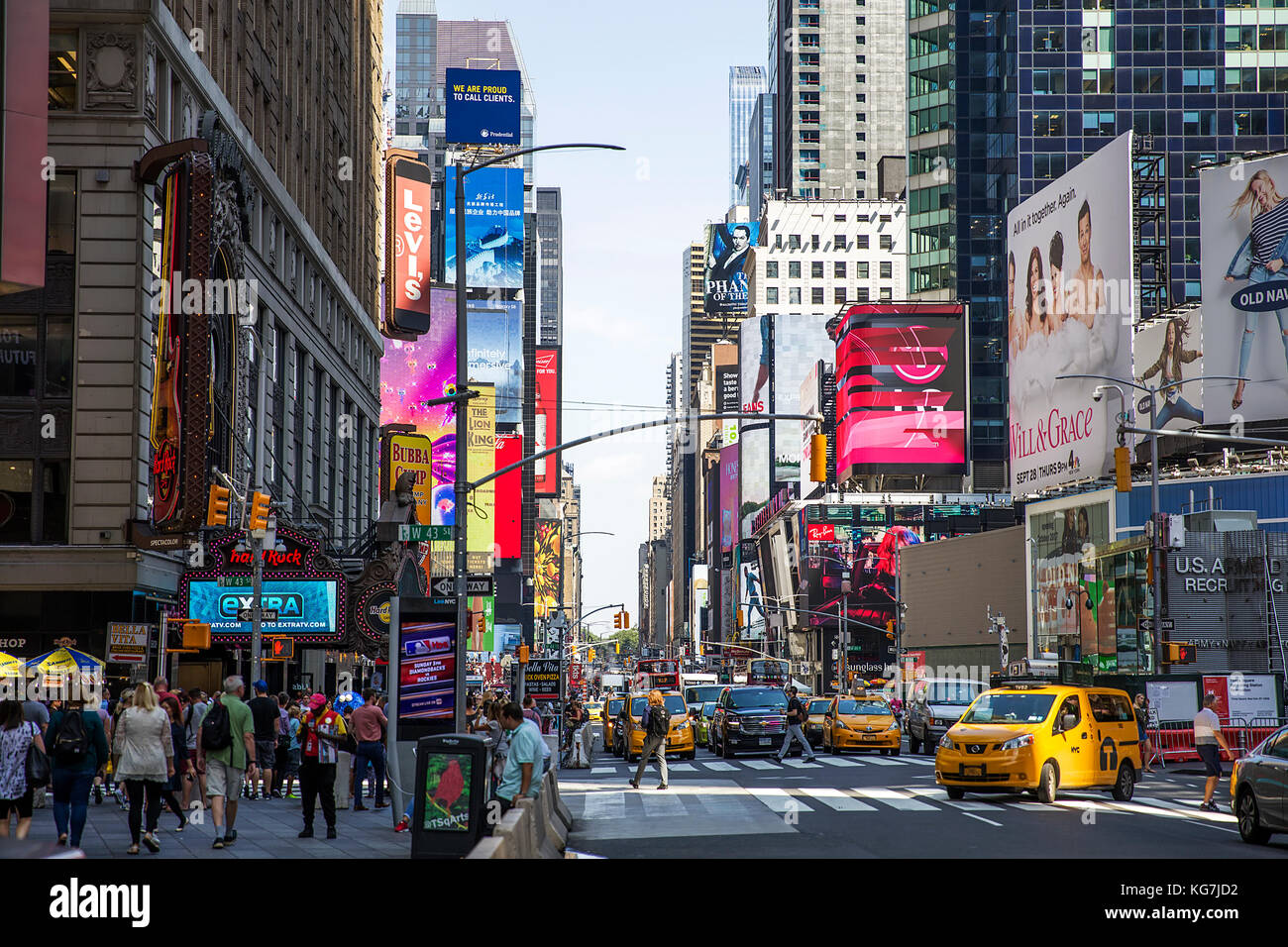Unidentified people on the Times Square, New York. Times Square is the ...