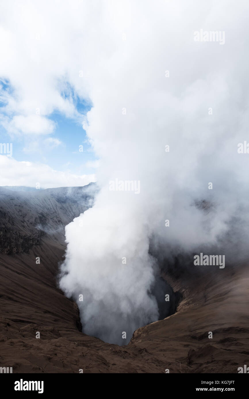 Volcanic eruption, close up on crater with smoke, Mount Bromo ...