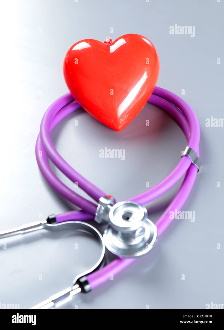 Red heart, stethoscope and medical equipmenton on white background ...