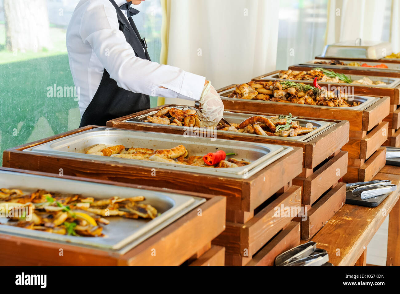 Outdoor Cuisine Culinary Buffet Dinner Catering. Group of people in ...