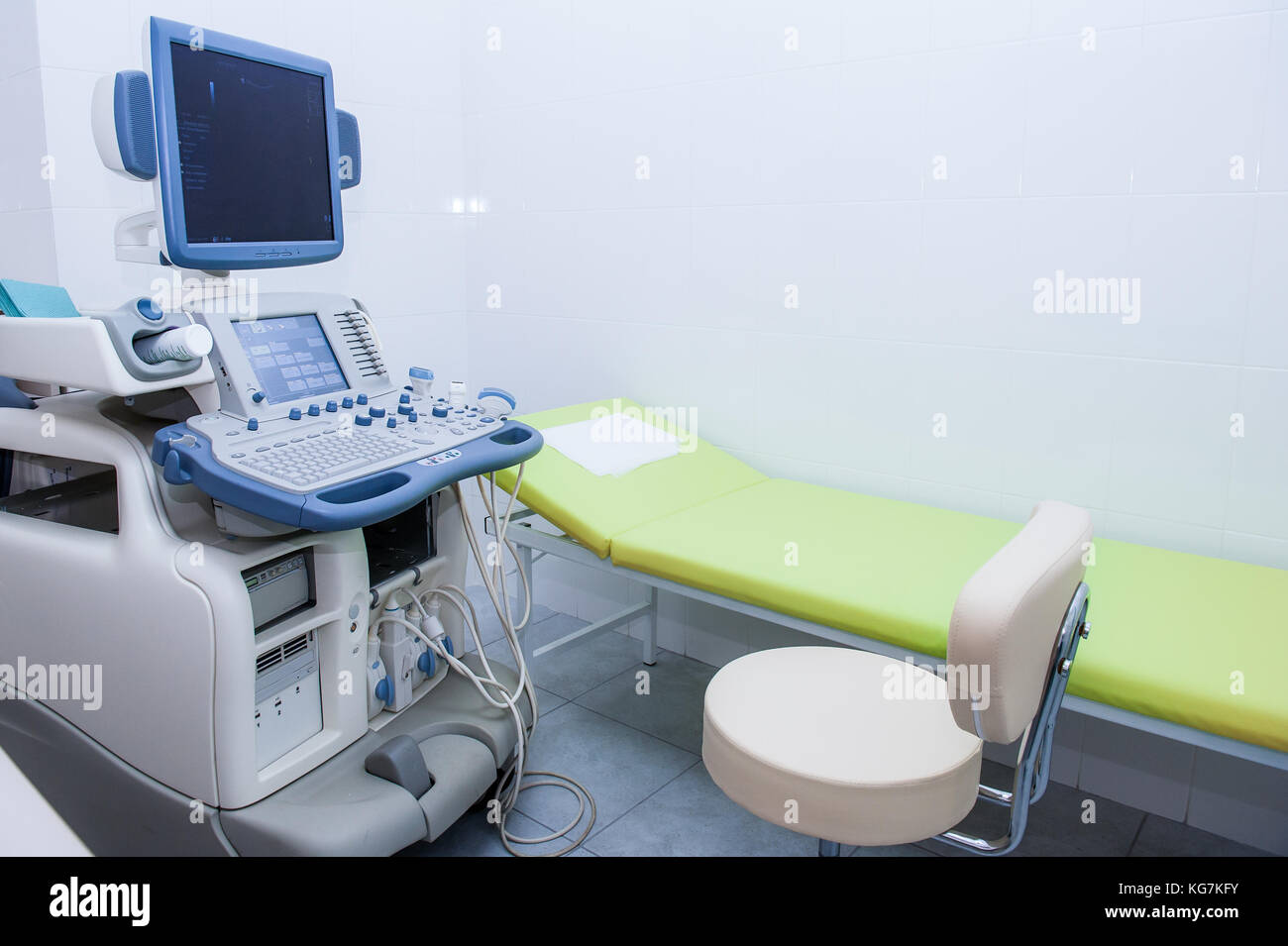 Interior of examination room with ultrasonography machine in hospital ...