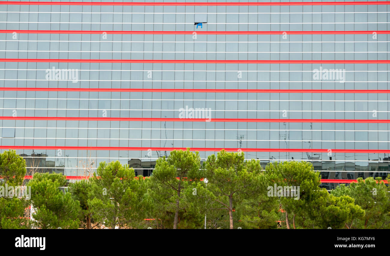 Glass facade with open window Stock Photo - Alamy