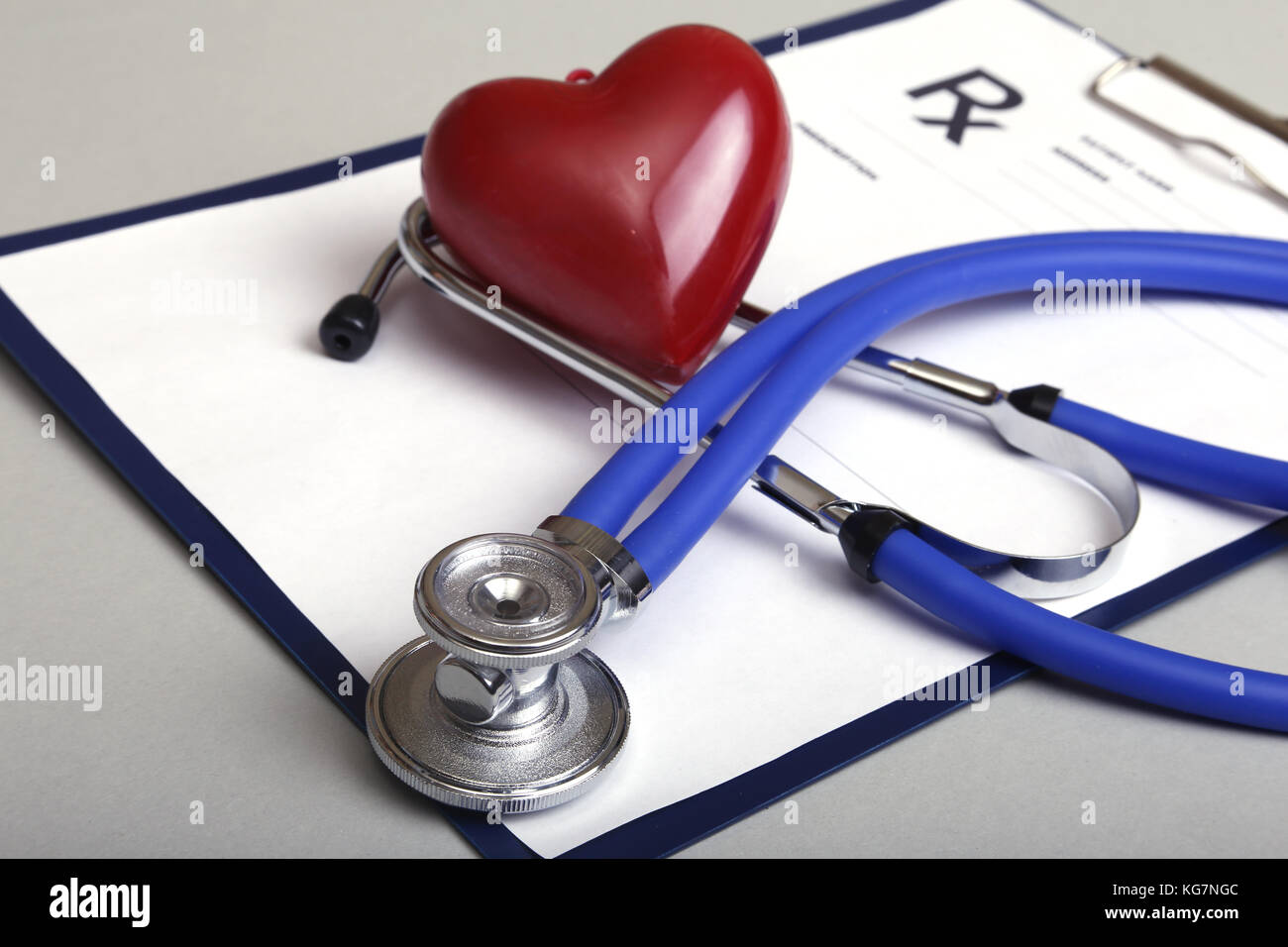 RX prescription, Red heart and a stethoscope on white background Stock ...