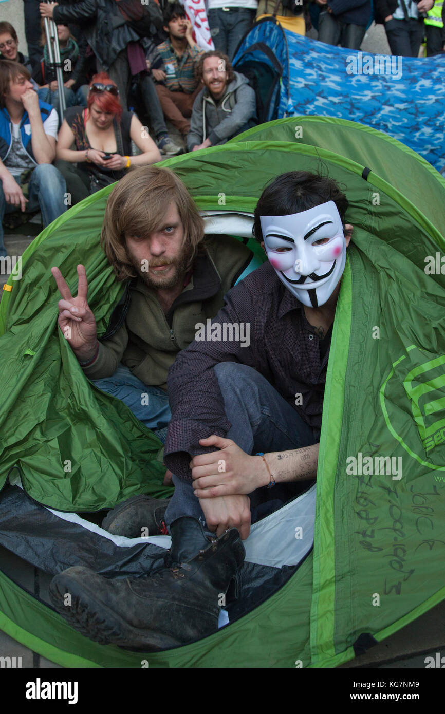 Protesters wear "V for Vendetta" masks. 12 May Occupy Protest in the ...