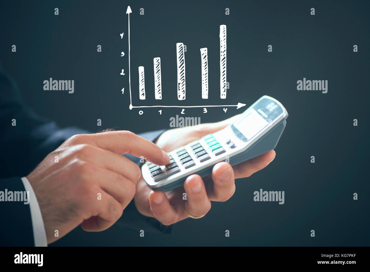 Businessman with calculator and graphic statistic Stock Photo - Alamy