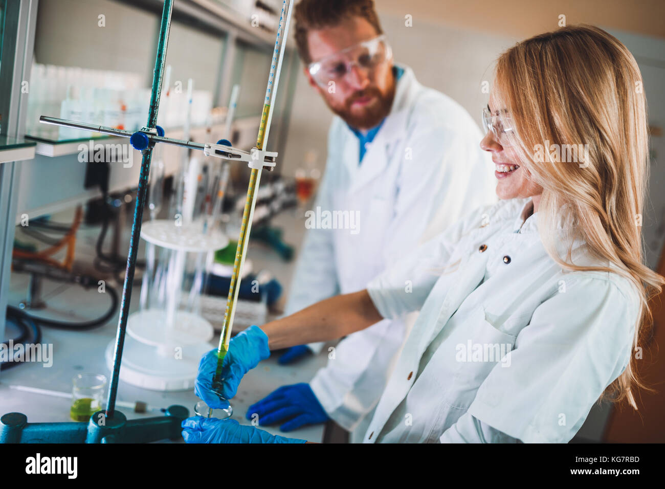 Young students of chemistry working in laboratory Stock Photo - Alamy