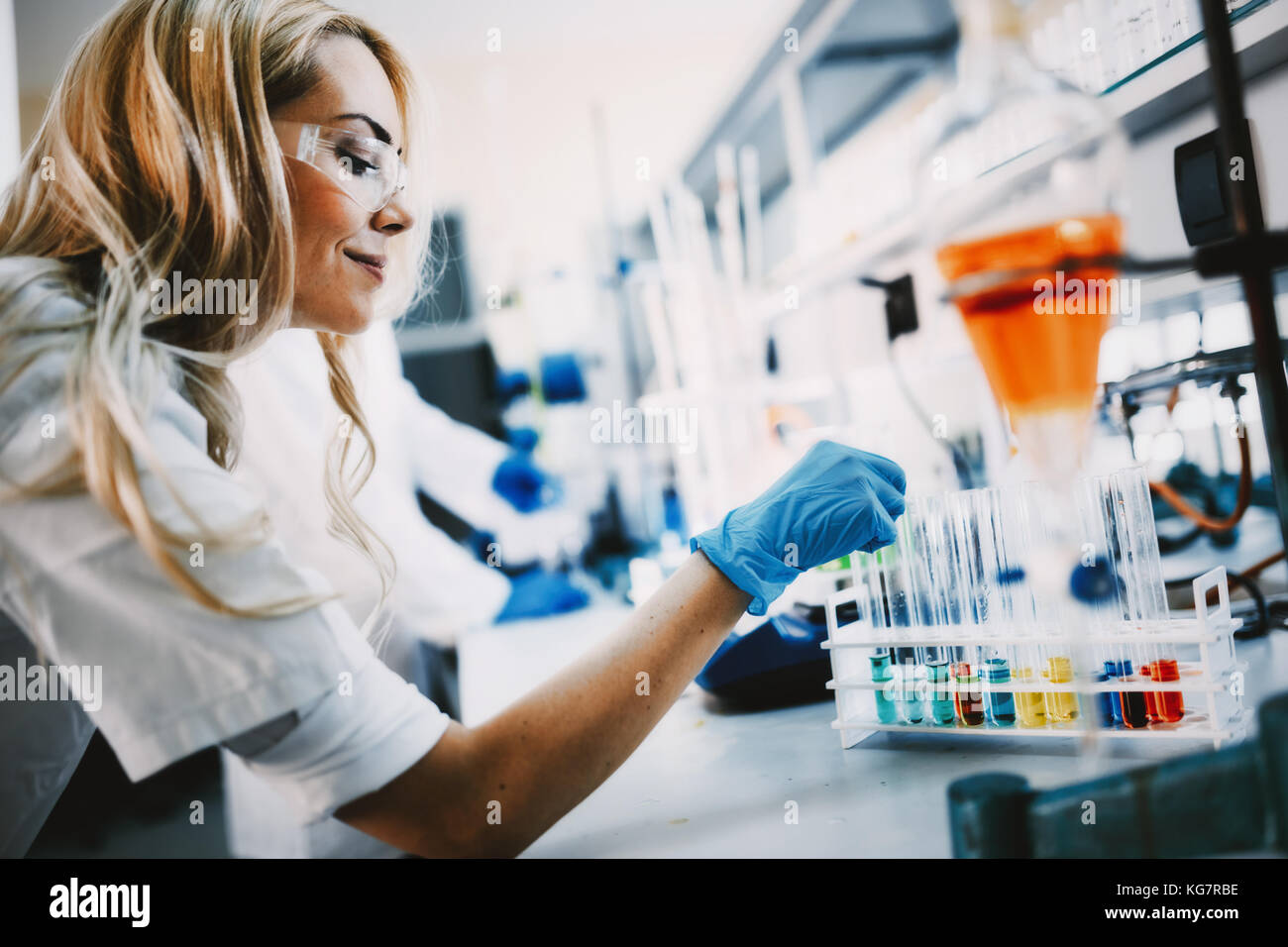 Female student of chemistry working in laboratory Stock Photo - Alamy