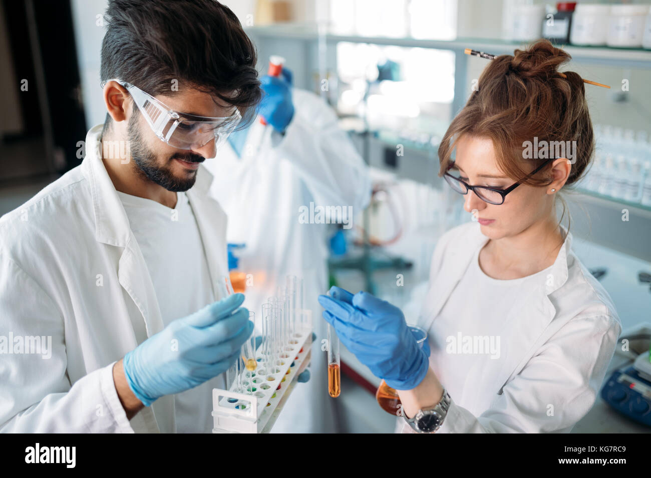 Young students of chemistry working in laboratory Stock Photo - Alamy