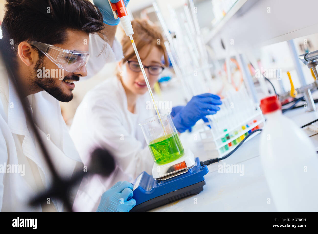 Young students of chemistry working in laboratory Stock Photo - Alamy