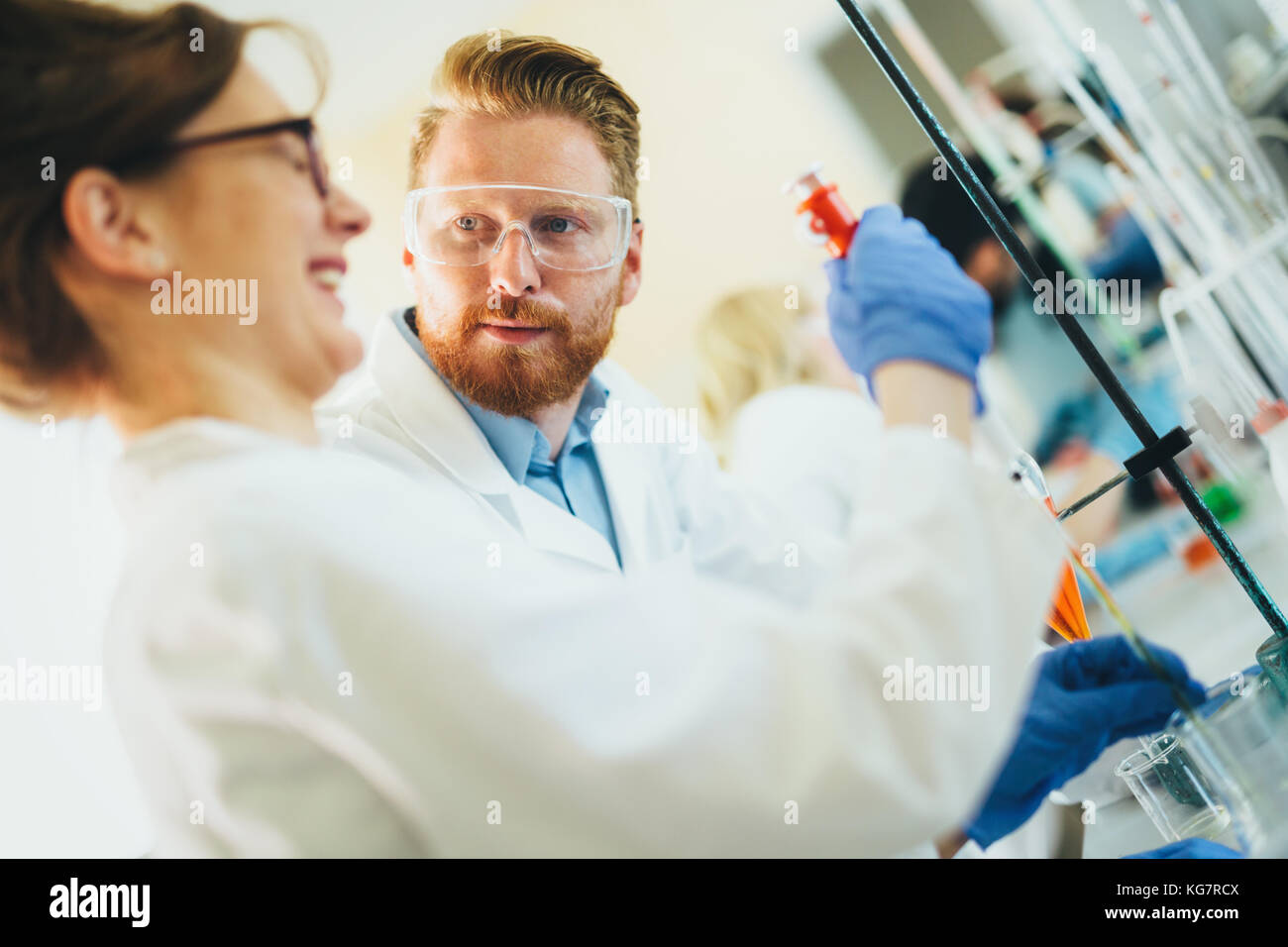 Chemistry students together laboratory hi-res stock photography and ...