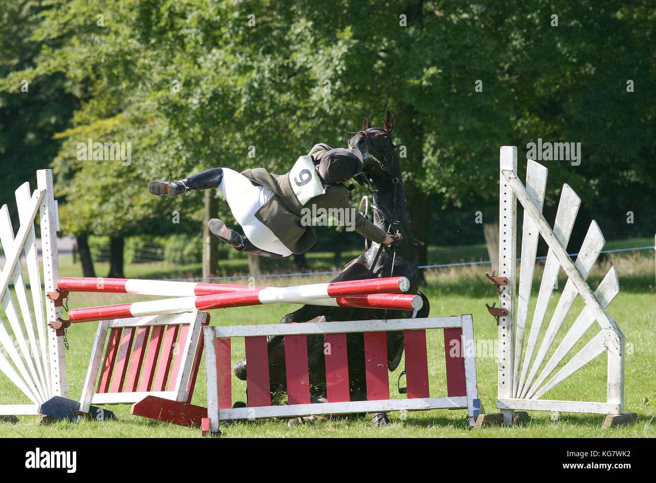Rider and horse jumping fence hi-res stock photography and images - Alamy