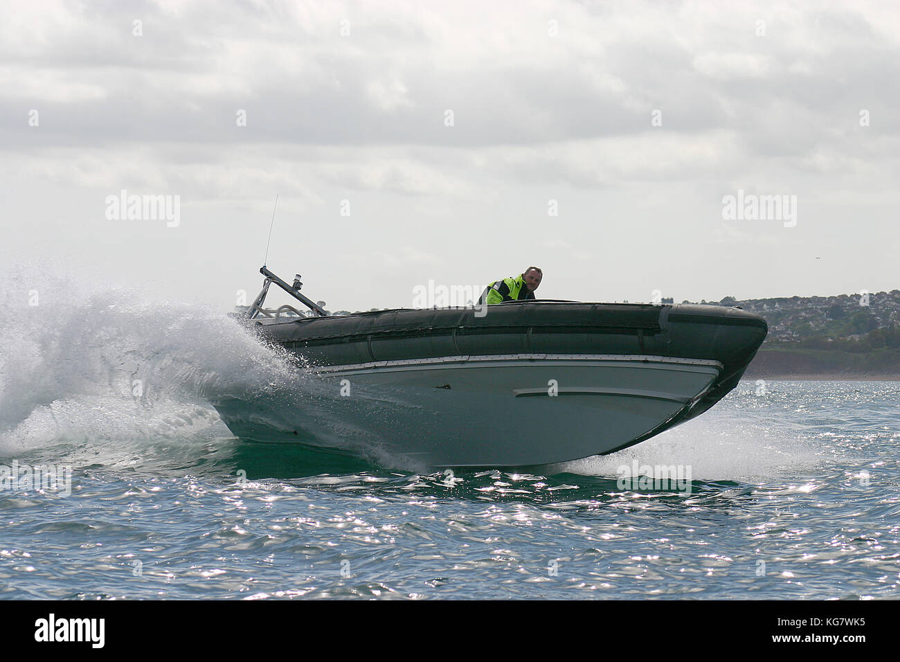 Rigid inflatable boat making fast turn at sea Stock Photo - Alamy