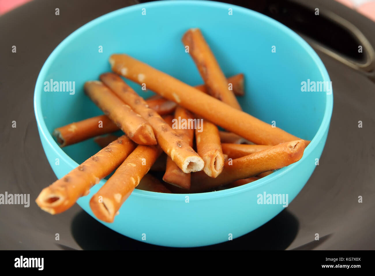 Salt stick snacks. Salt snacks in a plastic bowl Stock Photo - Alamy