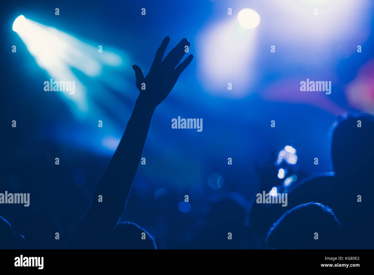 Cheering crowd at concert enjoying music performance Stock Photo - Alamy