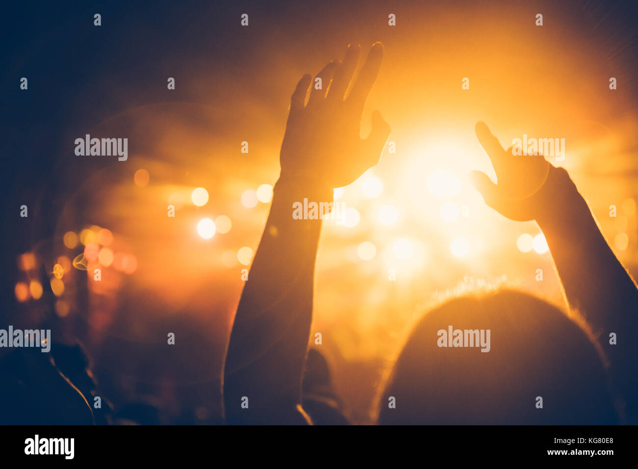 Cheering crowd at concert enjoying music performance Stock Photo - Alamy