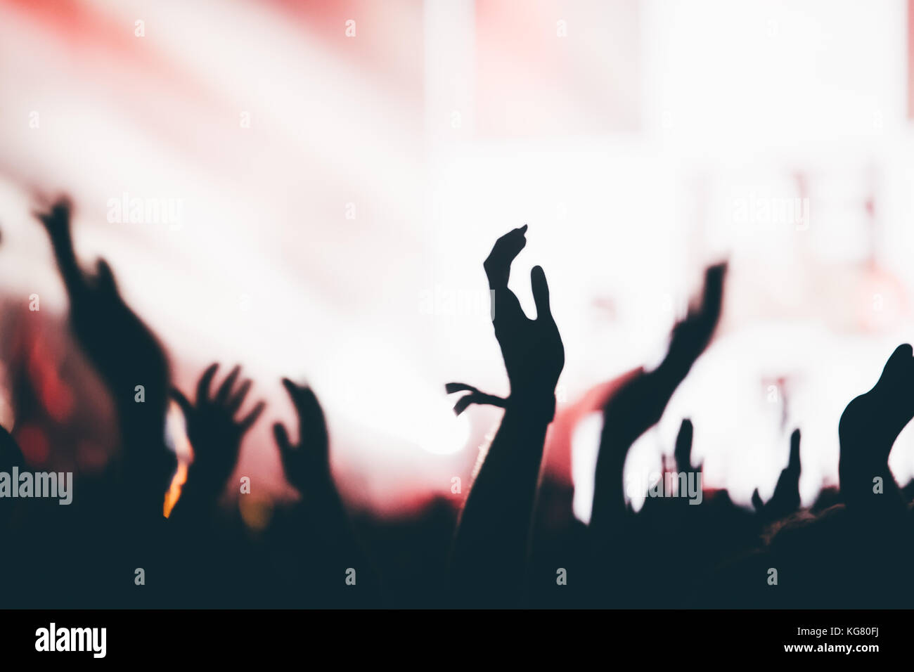 Cheering crowd at concert enjoying music performance Stock Photo - Alamy