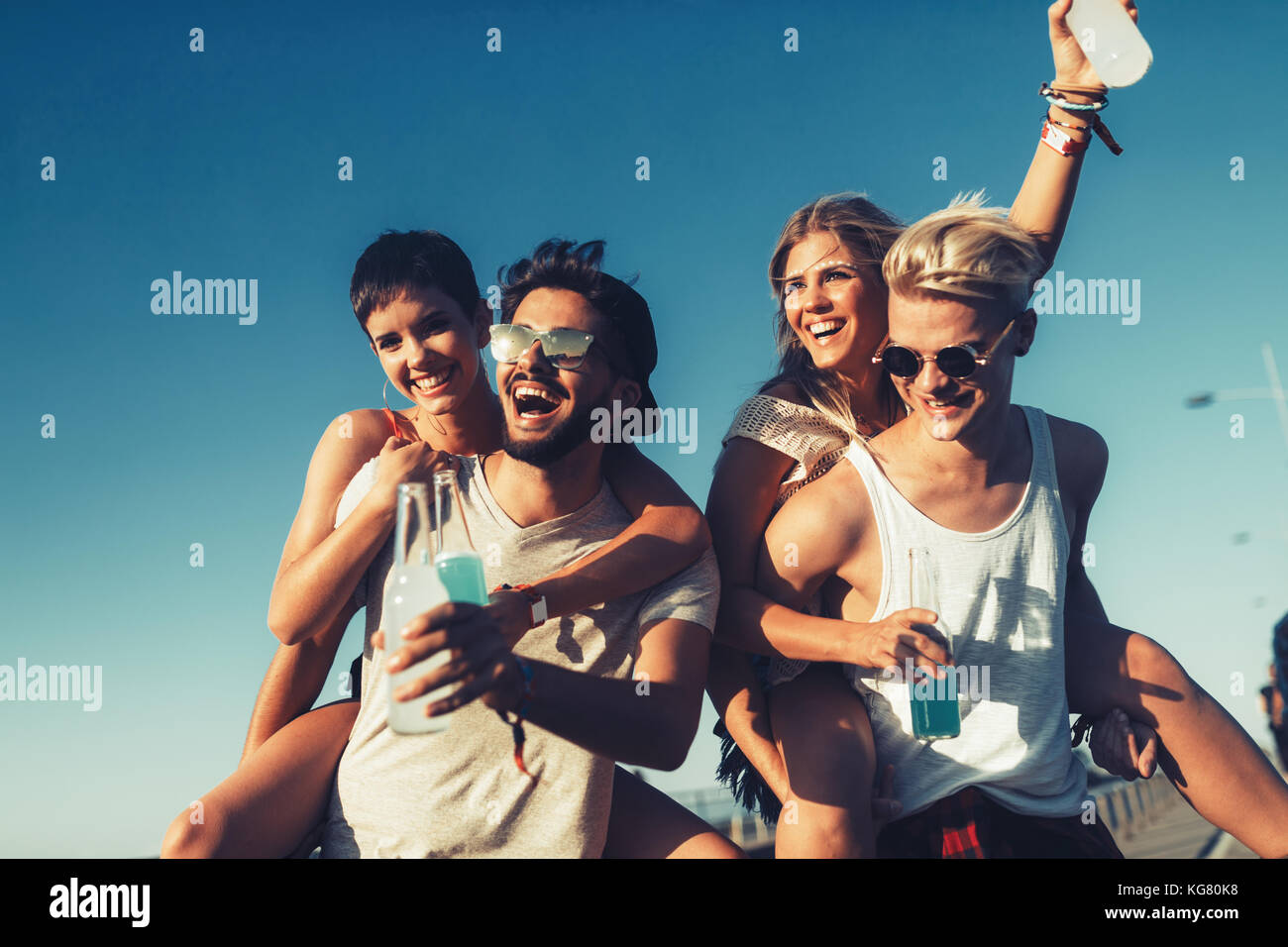 Group of young happy friends having fun time Stock Photo - Alamy