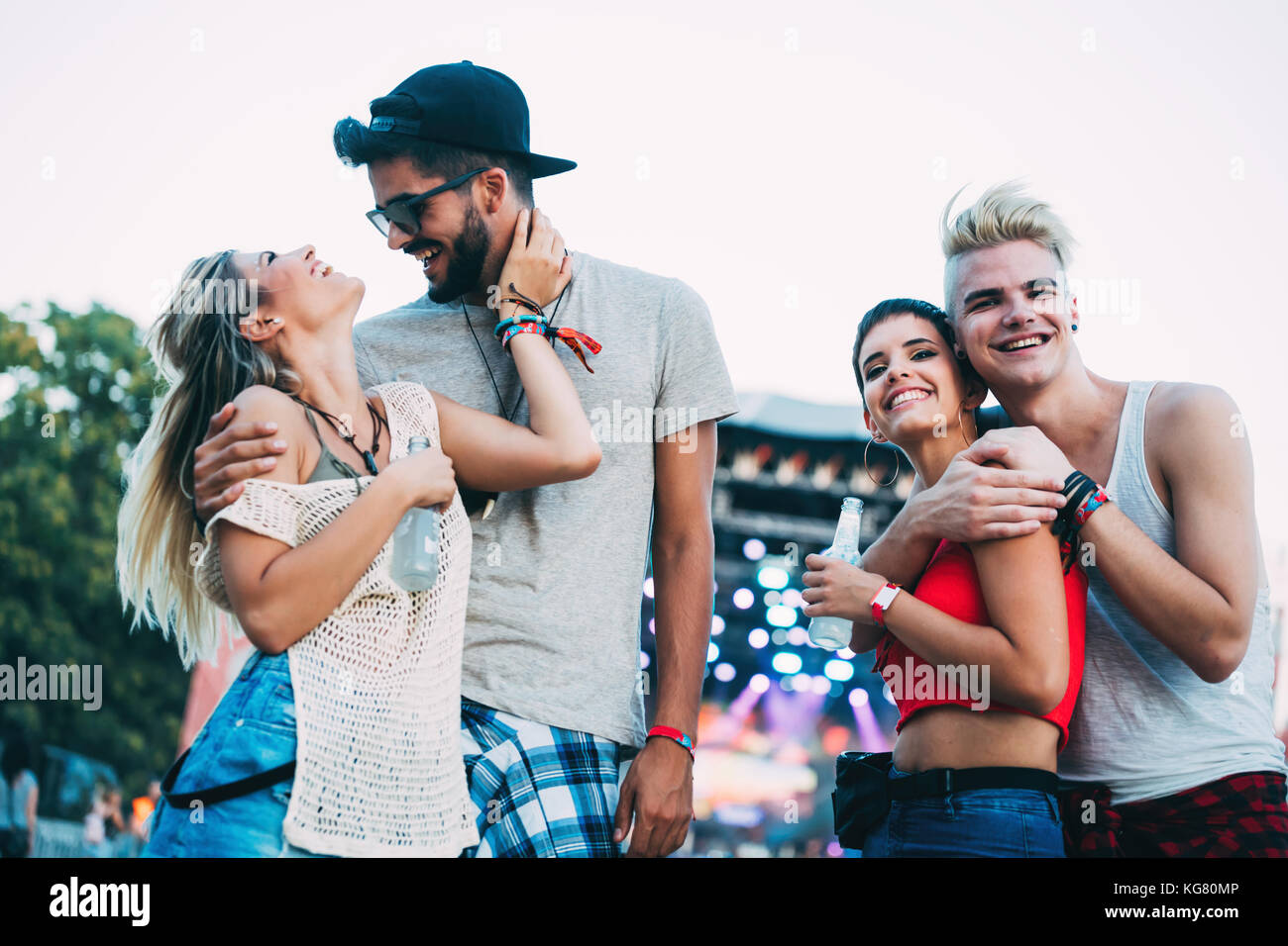 Group of friends having fun time at music festival Stock Photo - Alamy