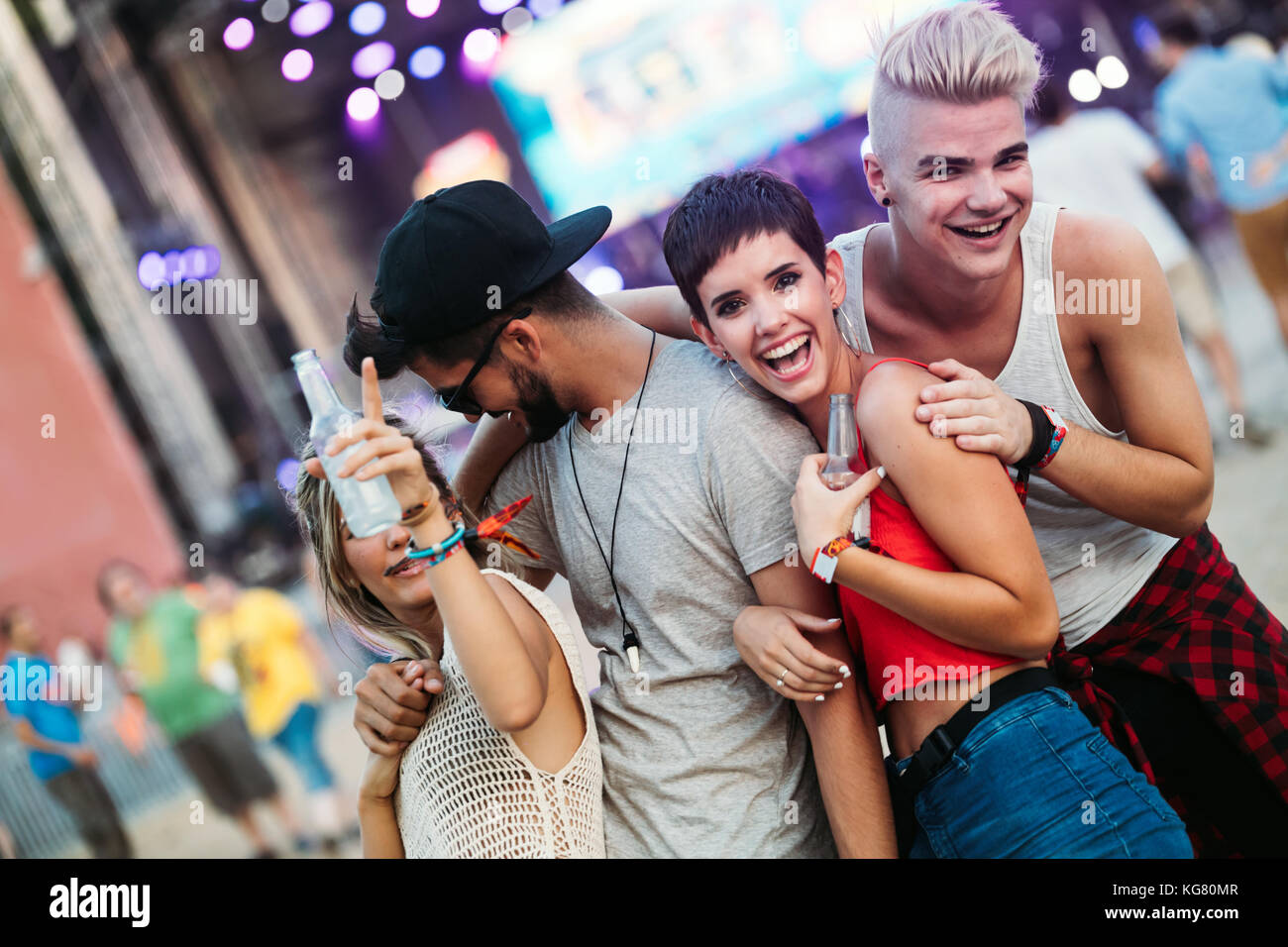 Group of friends having fun time at music festival Stock Photo - Alamy