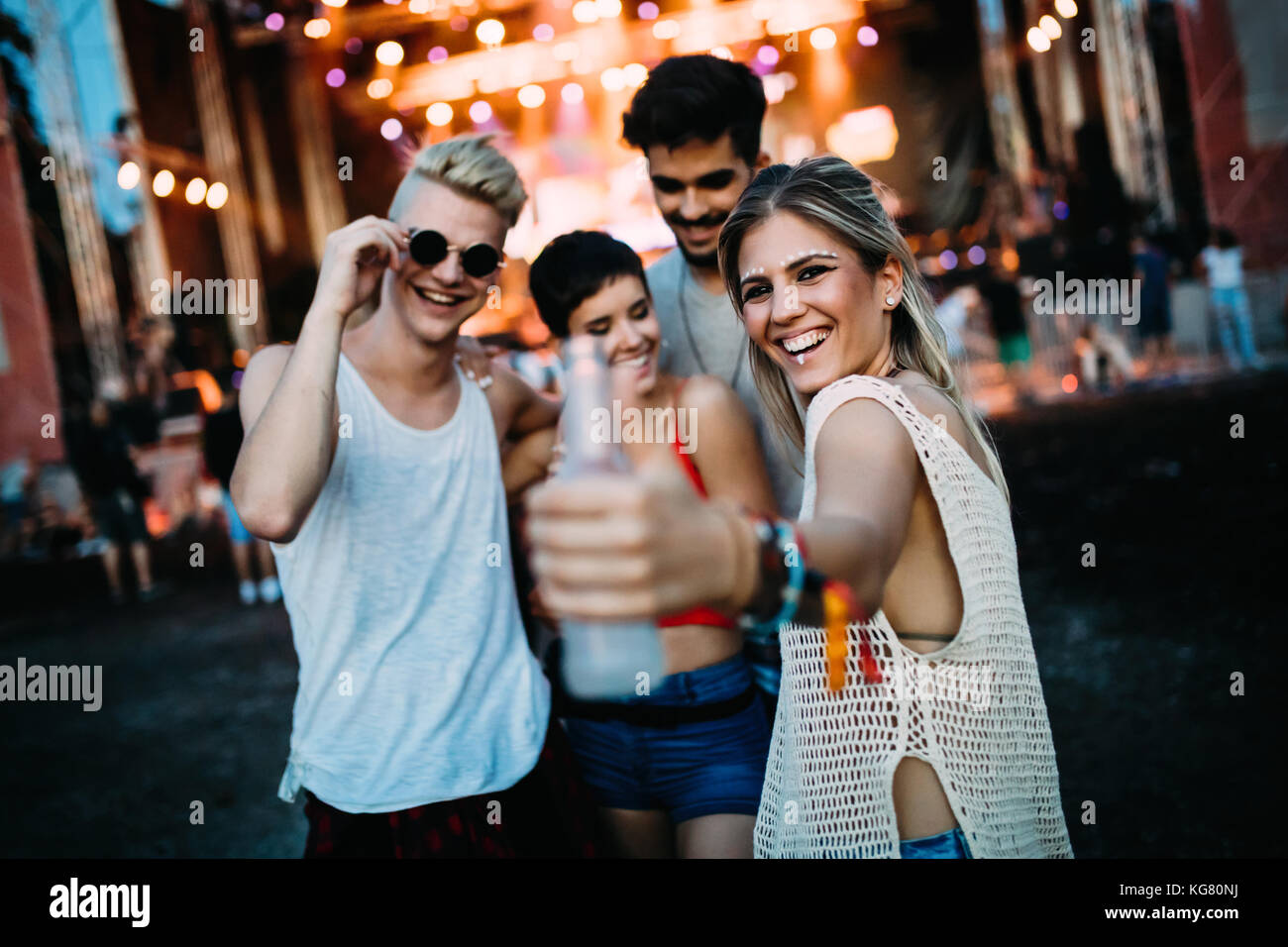 Group of friends having great time on music festival Stock Photo - Alamy