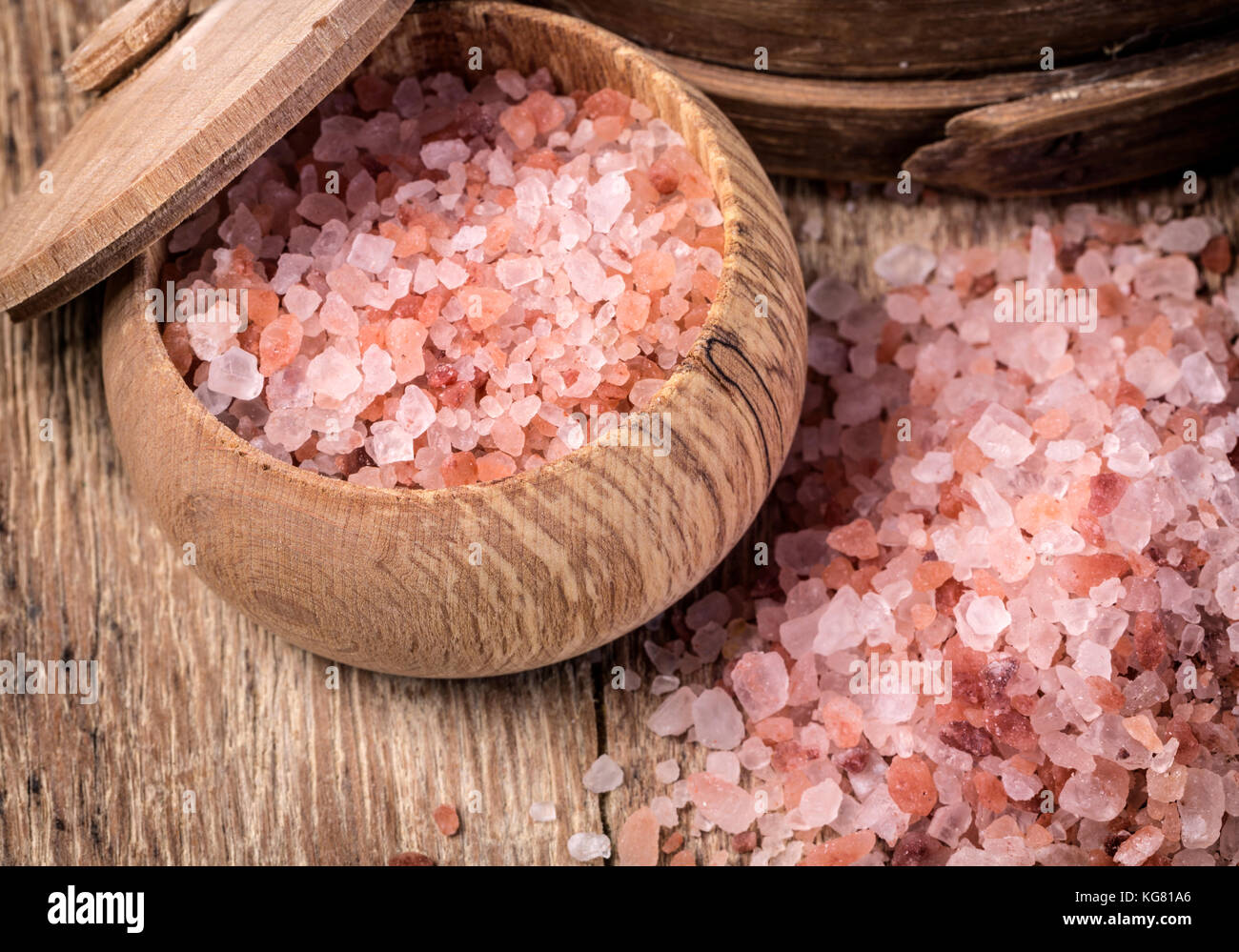 Pink salt from the Himalayas on wooden background Stock Photo - Alamy