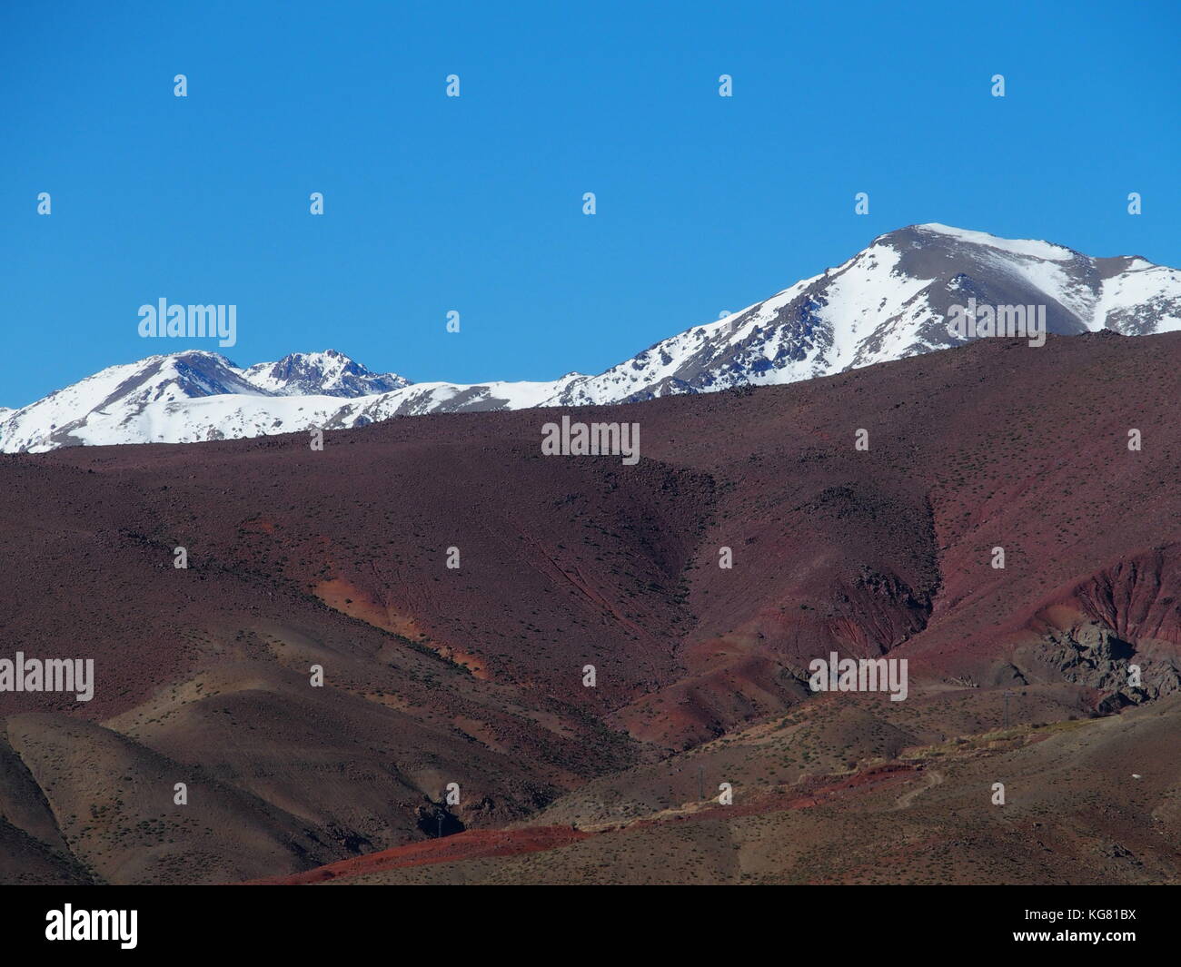 Snow covered peaks at high ATLAS MOUNTAINS range landscape in MOROCCO ...