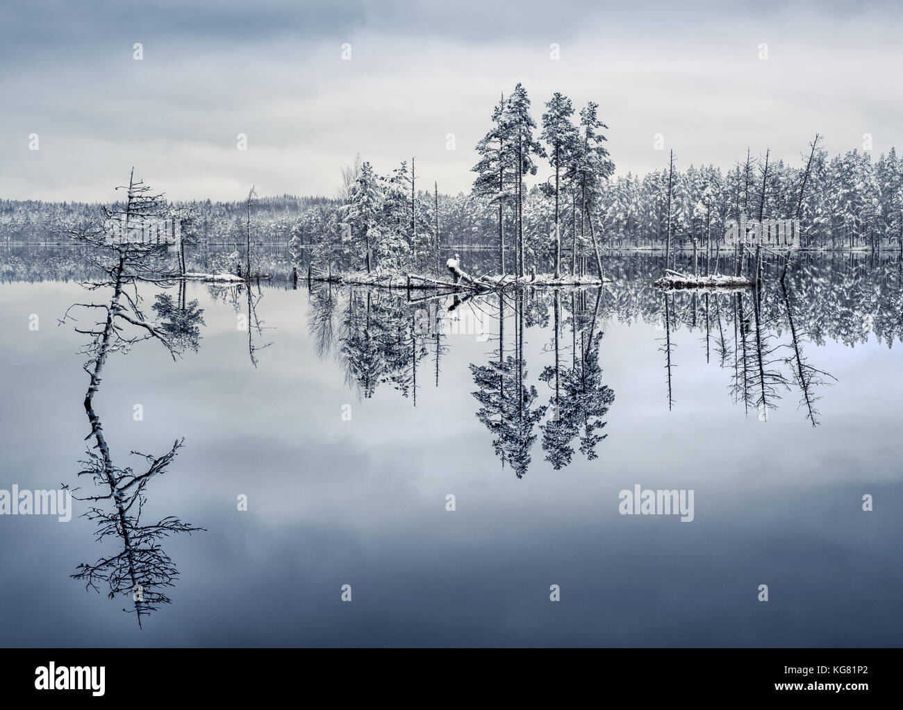 Scenic landscape with lake reflection and snow at winter evening Stock ...