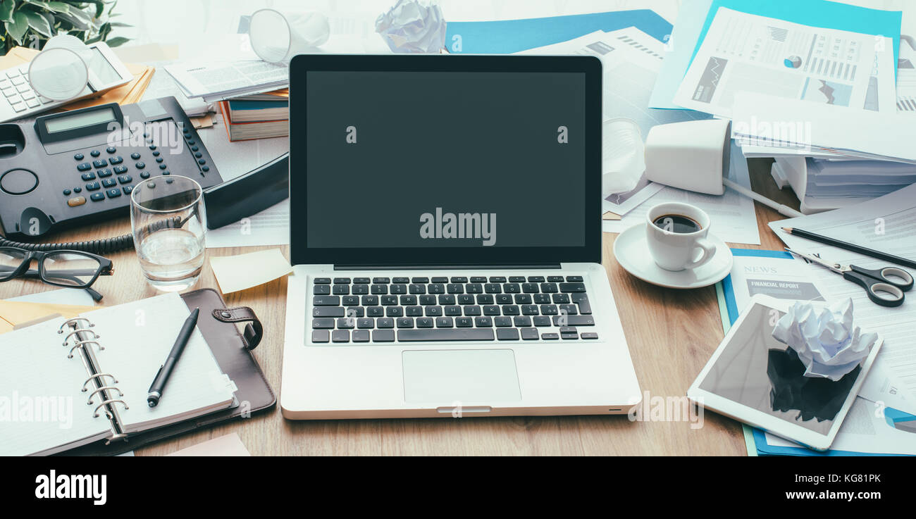 Business messy and cluttered work desktop in the office, stress ...