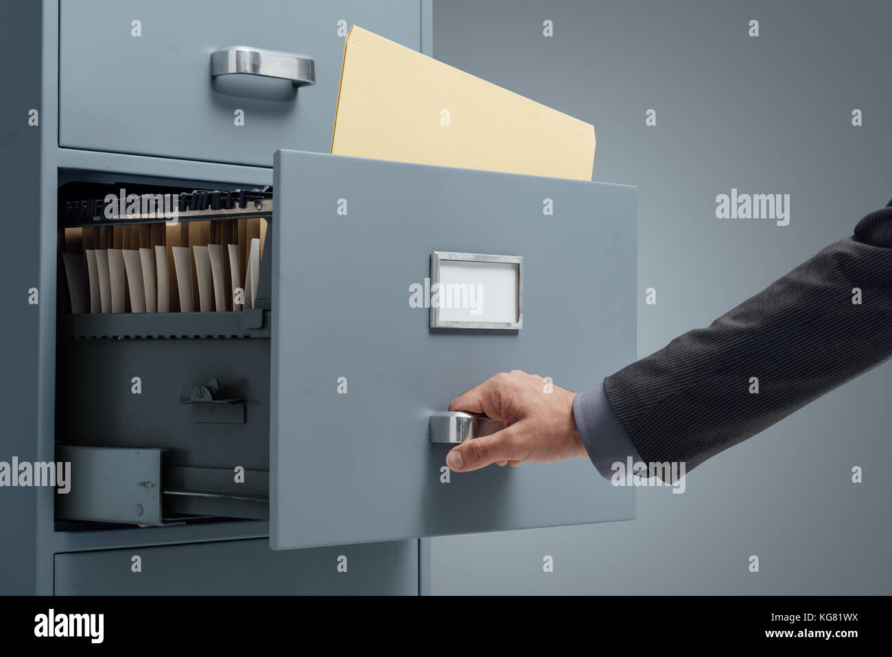 Hand opening drawer in hi-res stock photography and images - Alamy