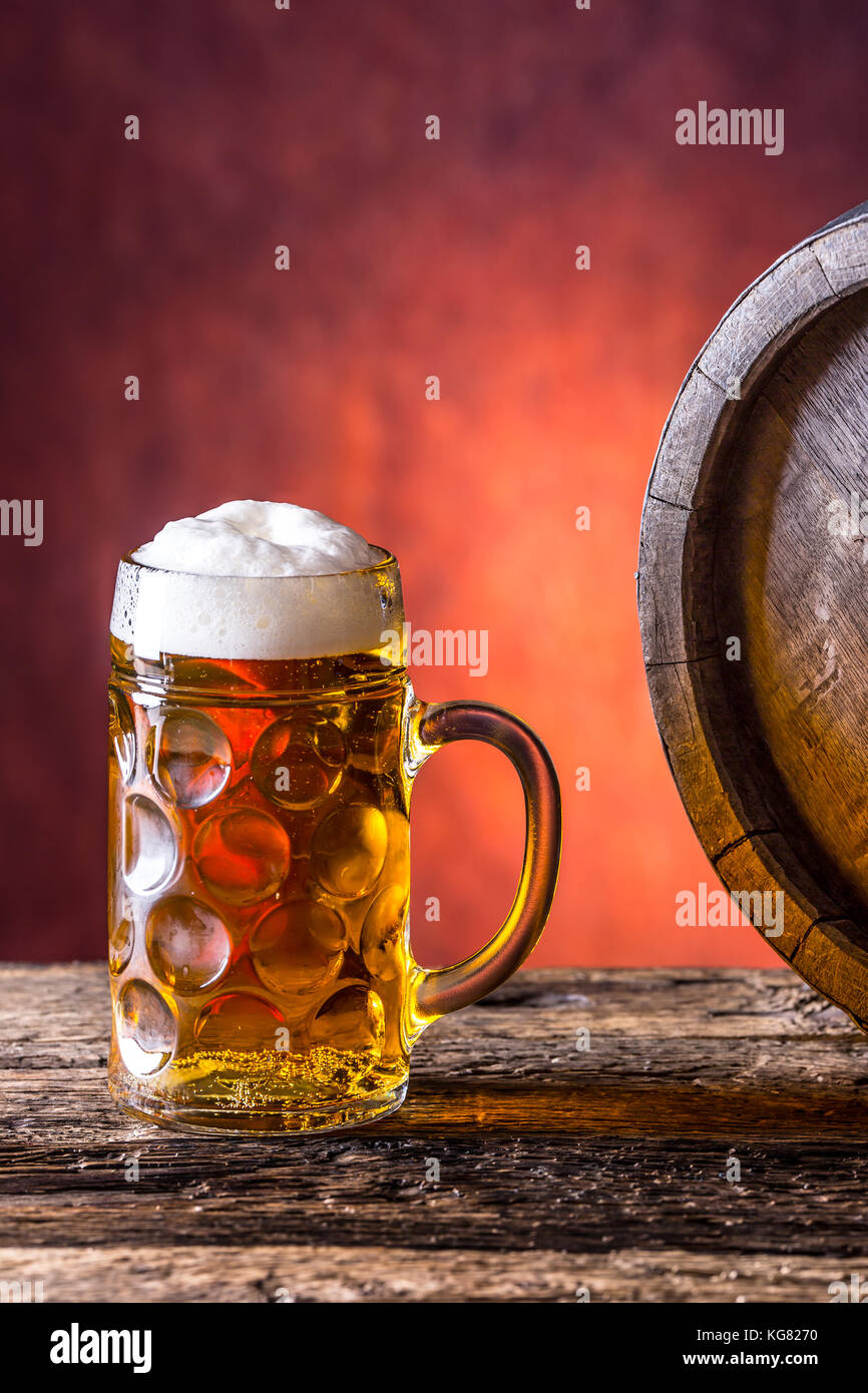 Beer with oak barrel. Draft beer. Draft ale. Golden beer. Golden ale ...