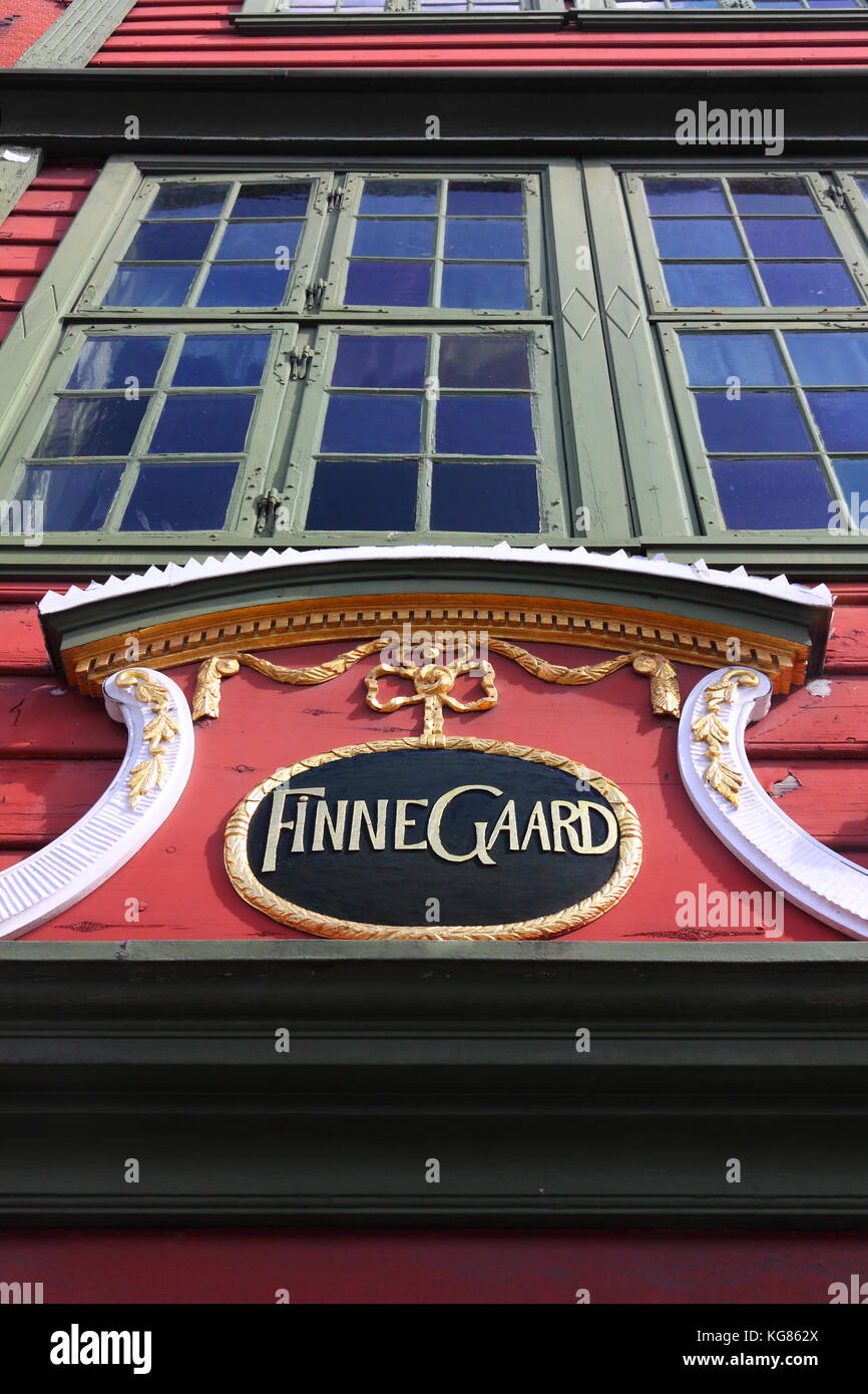 Finne Gaard sign and architectural detail on a historic building in ...