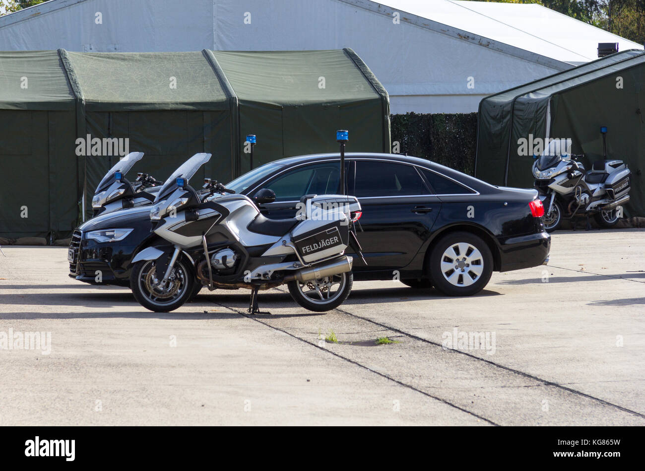 german feldjaeger, military police motorcycles and vehicles stands in ...