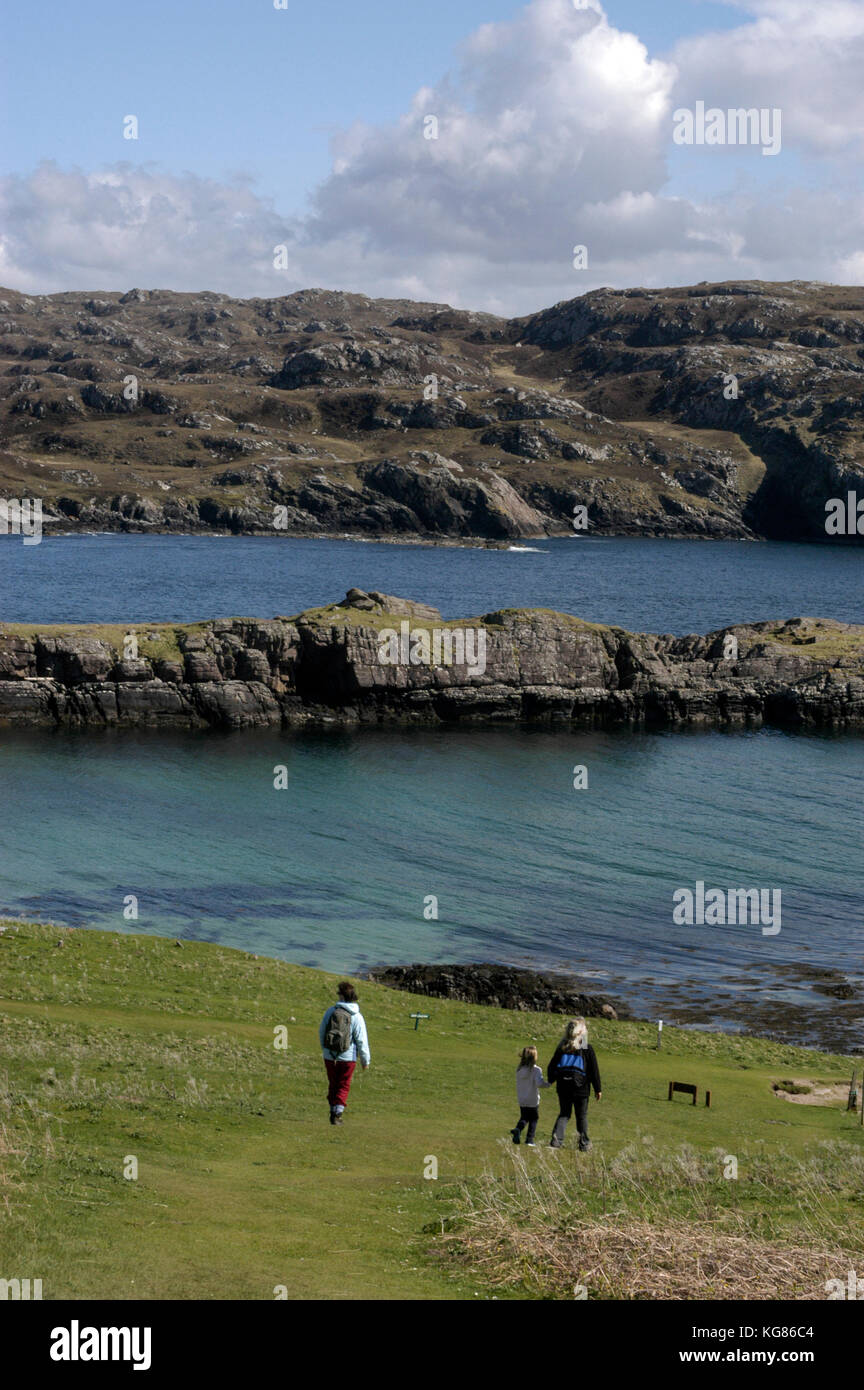 The barren landscape of the inhabited Handa Island. In the distance is ...