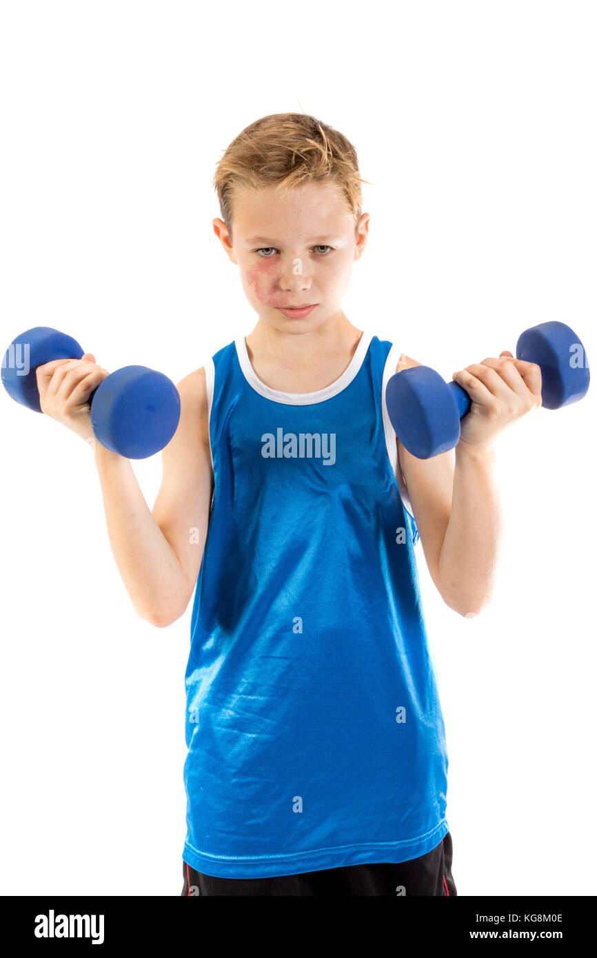 Pre-teen boy lifting weights isolated on a white background Stock Photo ...