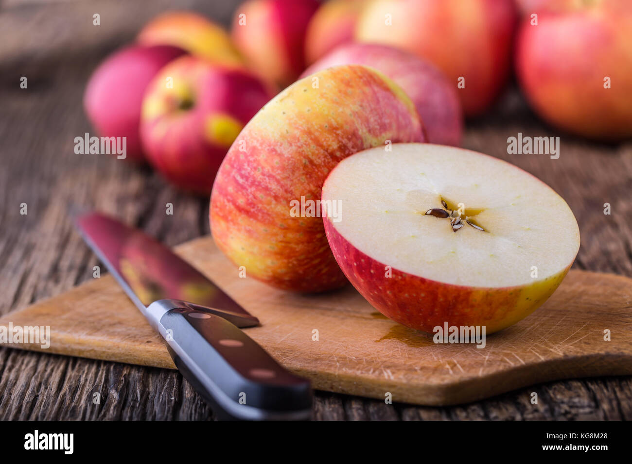 Apple. Red Apples in other positions on wooden board Stock Photo - Alamy