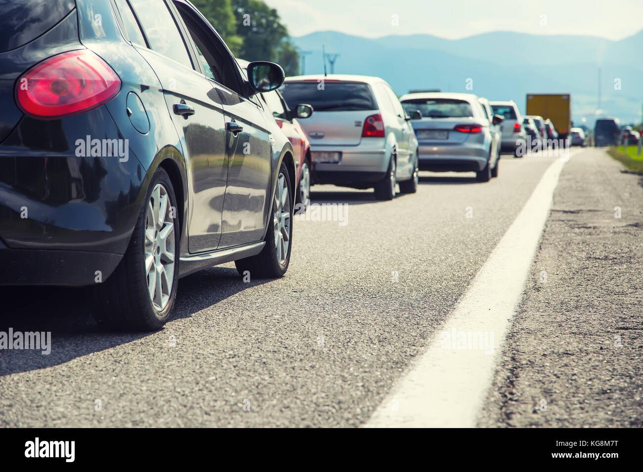 Traffic jam on the highway in the summer holiday period or in a traffic ...