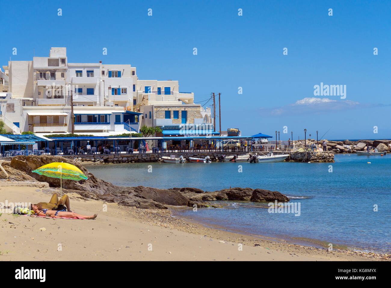 Beach of the small fishing village Apollonas, North side of Naxos ...