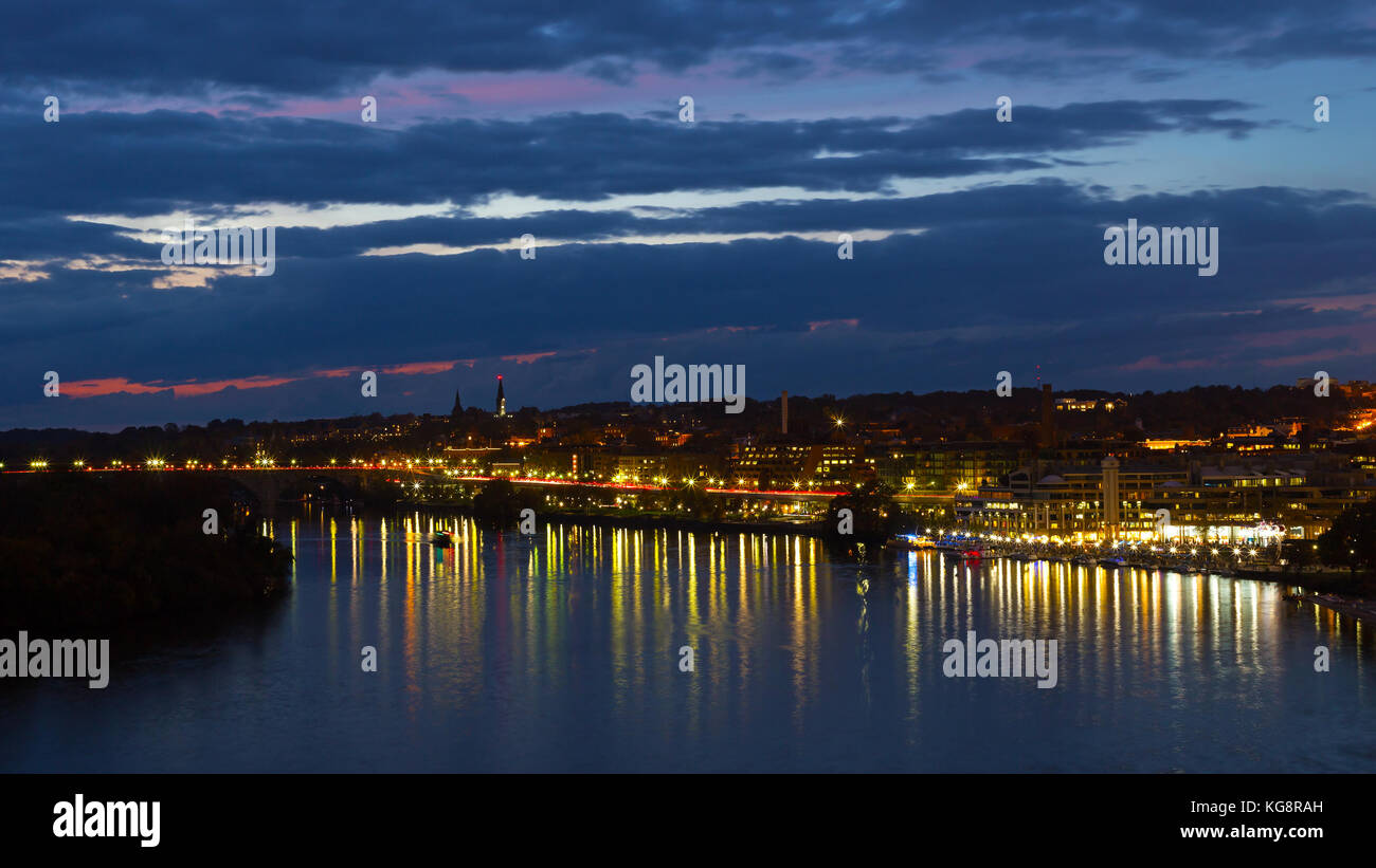 Night scene of Georgetown waterfront in Washington DC, USA. Illuminated ...