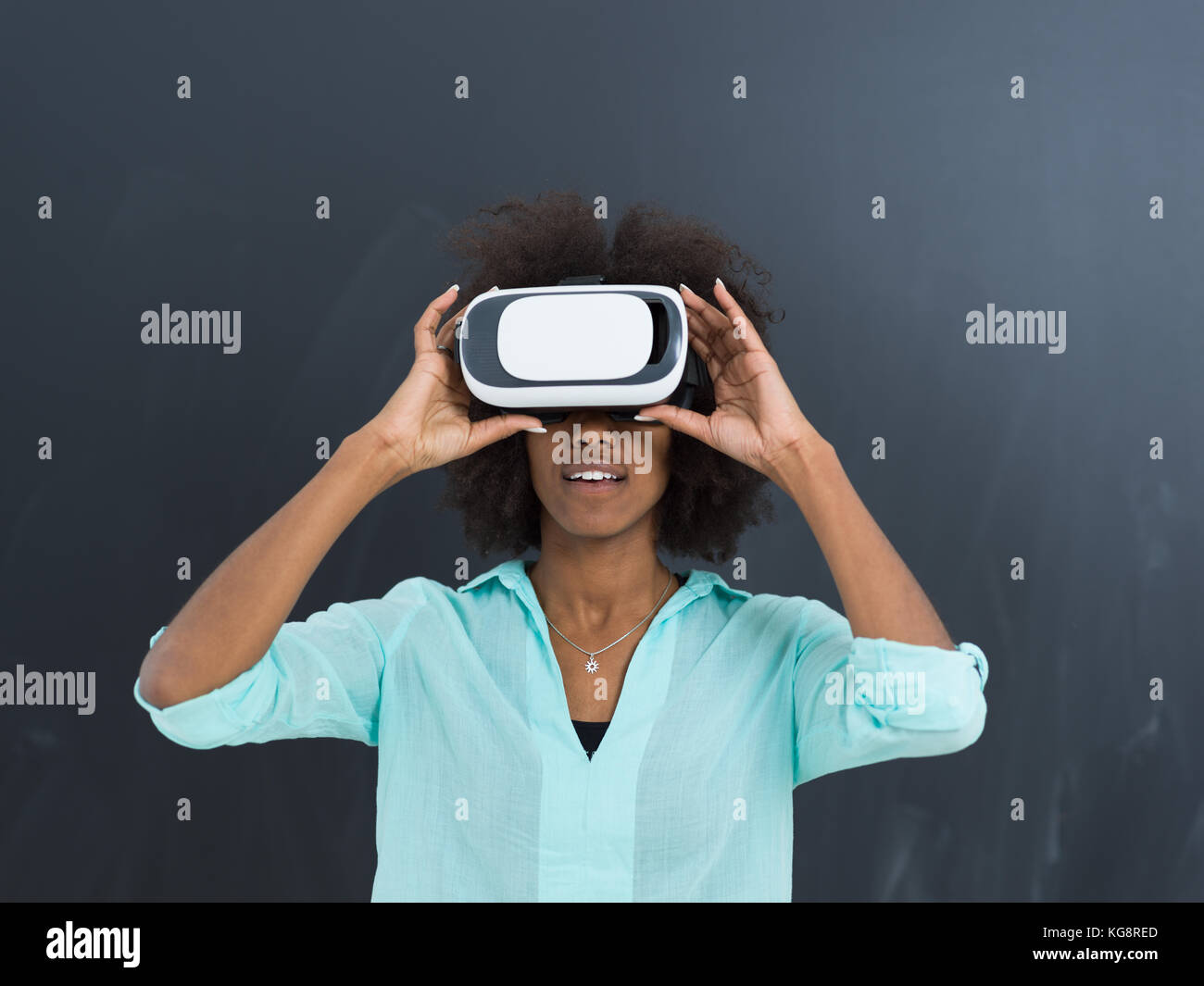 Happy african american girl getting experience using VR headset glasses ...
