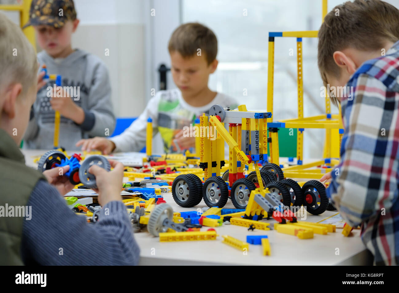 Child plays with a builder kit Stock Photo - Alamy