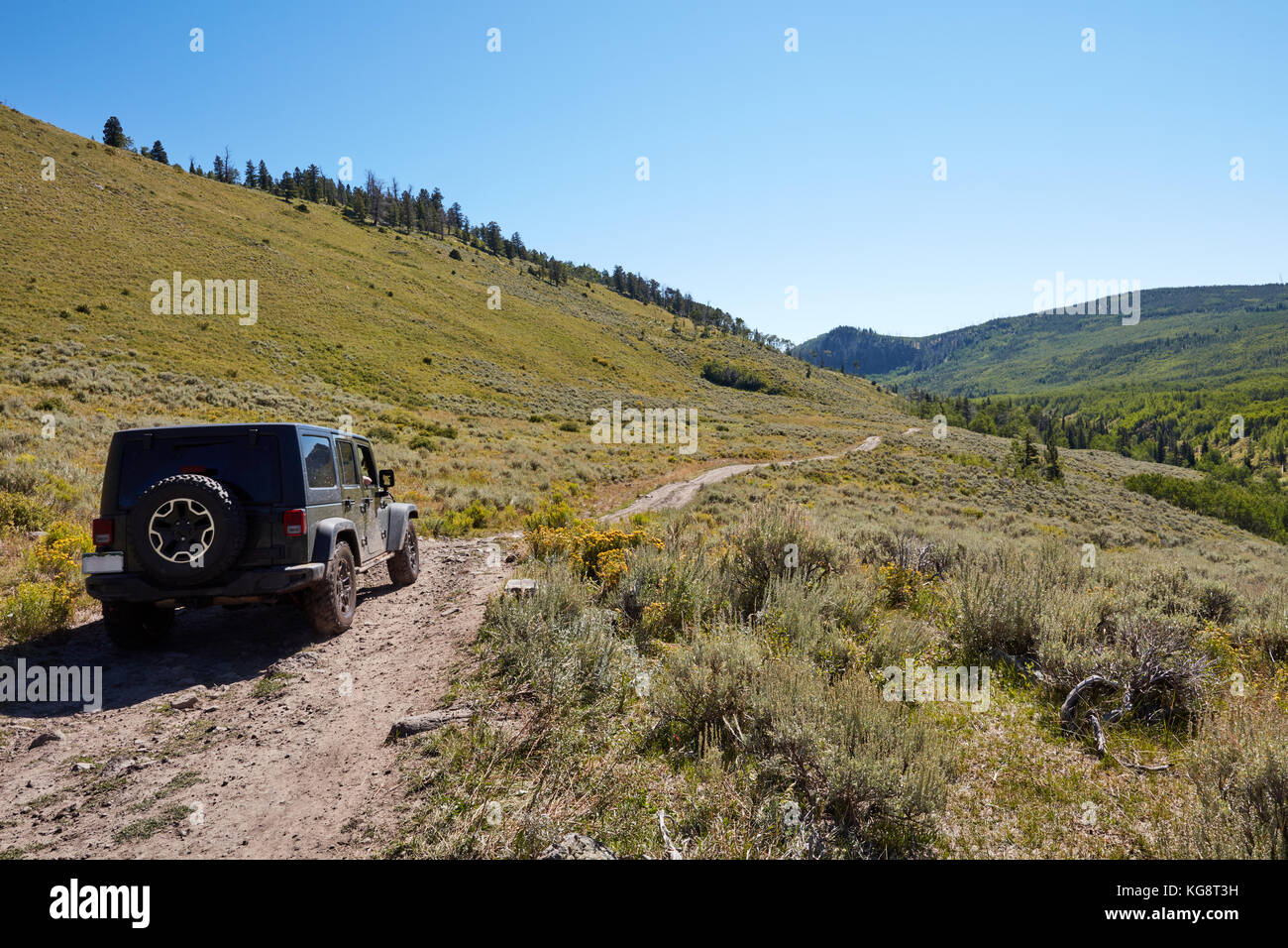 Remote dirt road on mountain slope hi-res stock photography and images ...