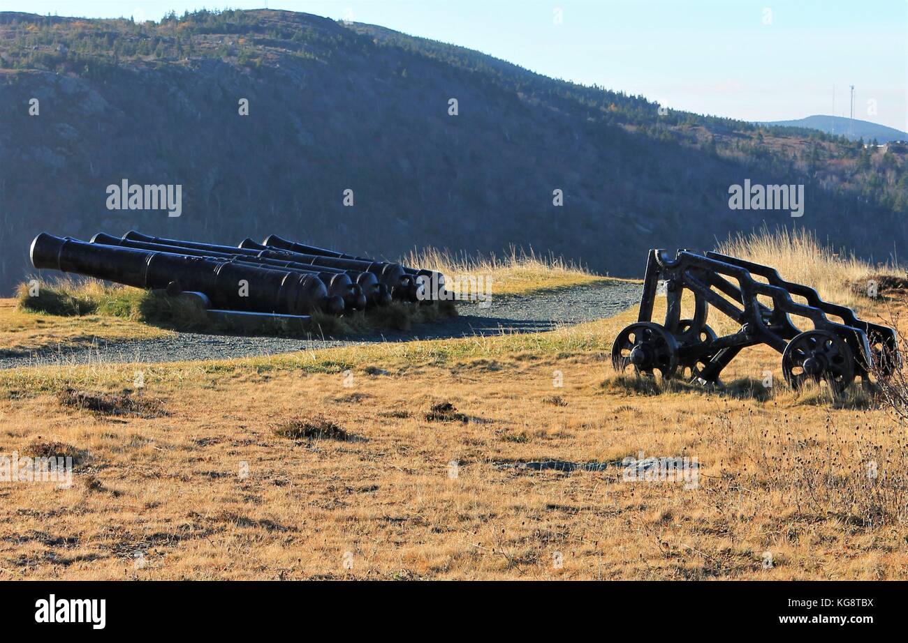 Old cannons lined up trail side, Signal Hill, Newfoundland. Sunny ...