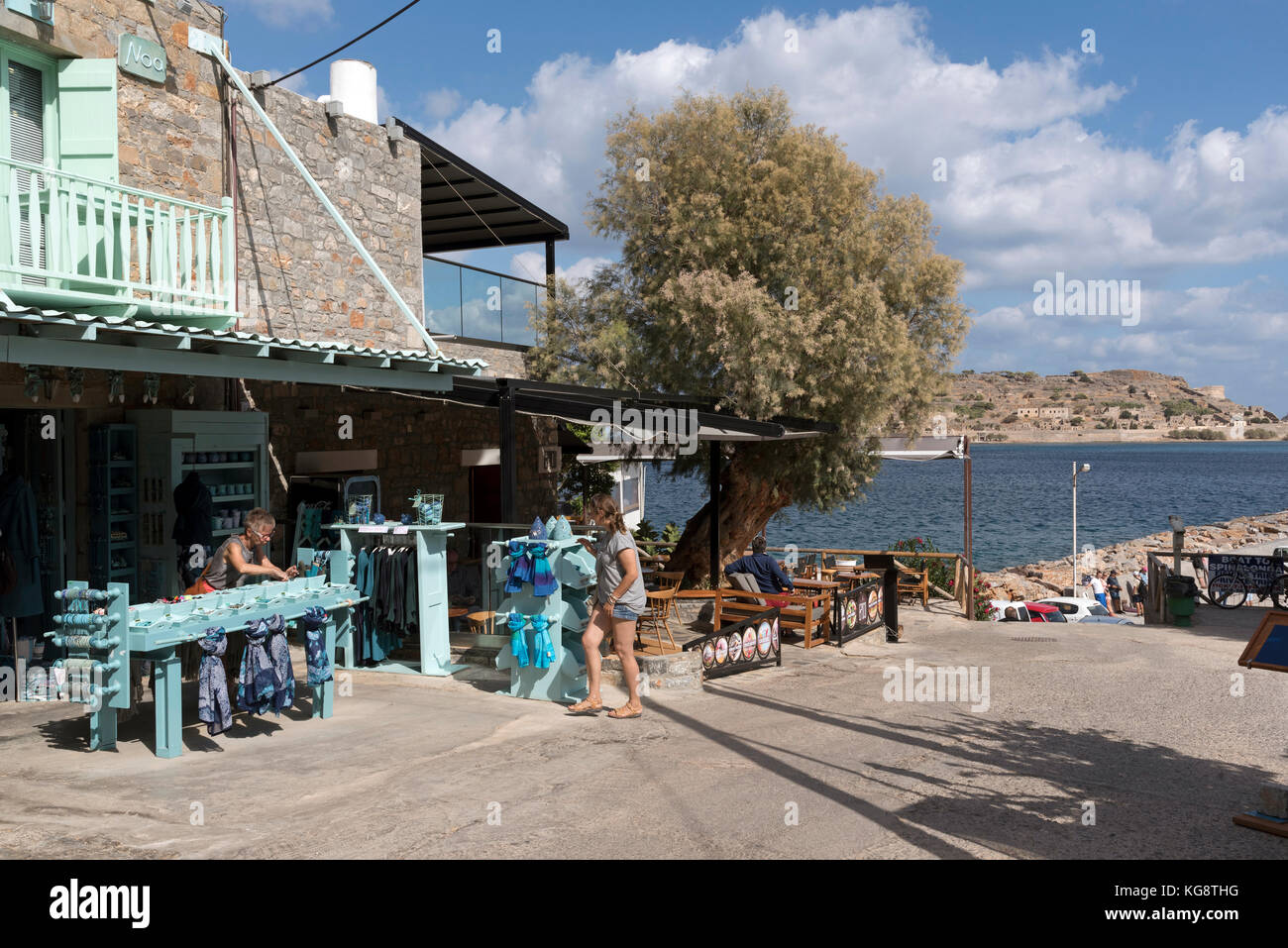 Souvenir shop in the seaside resort of Plaka with a view to Spinalonga ...